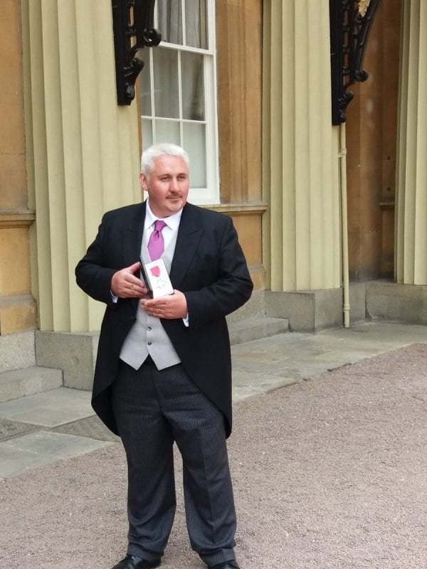 Royal appointment for Yellow Door’s Simon as he receives MBE from ...